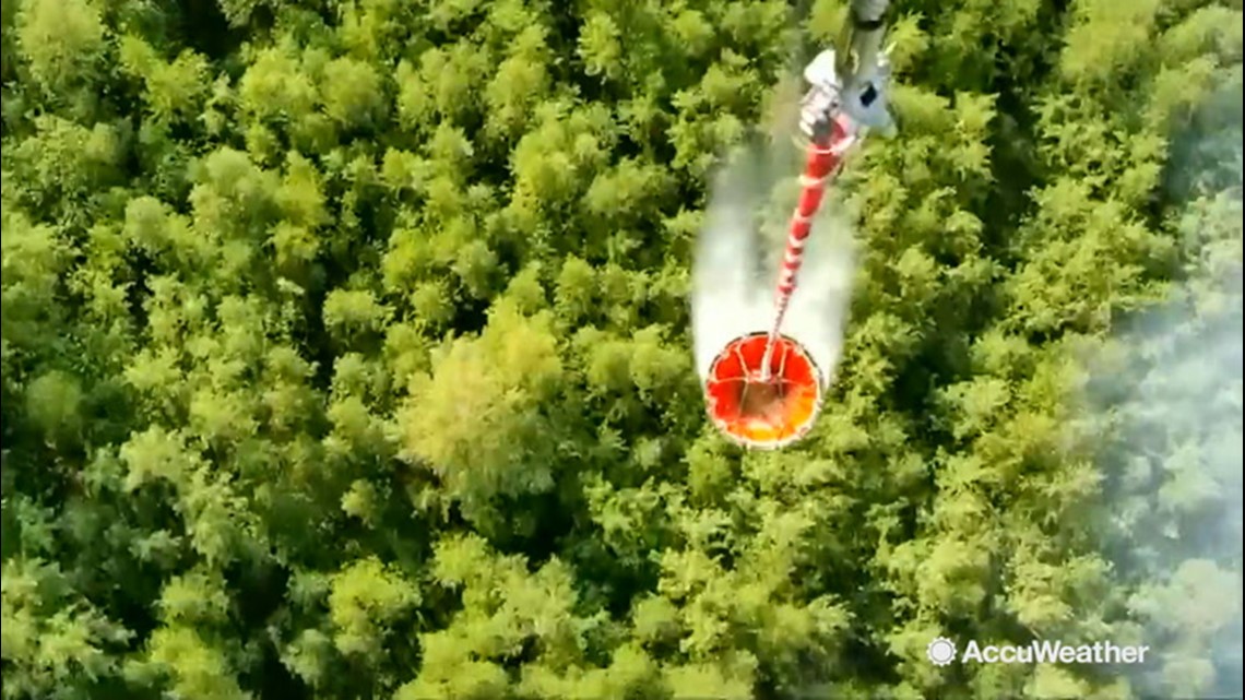 Firefighting crews use helicopters to combat wildfire | whas11.com