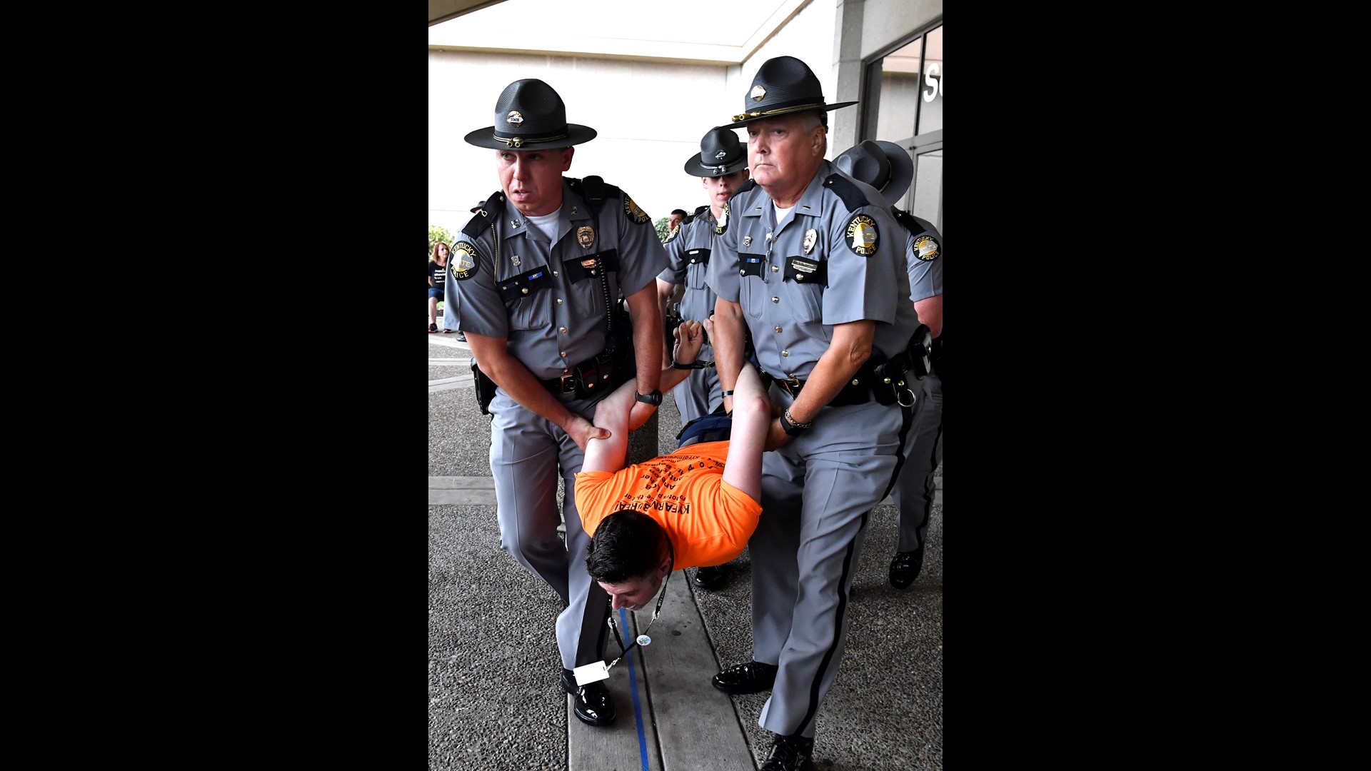 Fairness Campaign director arrested during Kentucky Farm Bureau ham ...