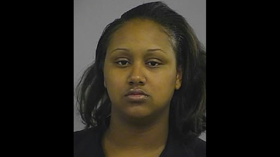 Woman accused of breaking in car, stealing purse, going on shopping ...