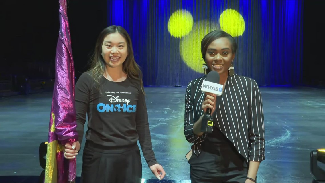 Goofy photobombs reporter Taylor Woods while at Disney on Ice | whas11.com
