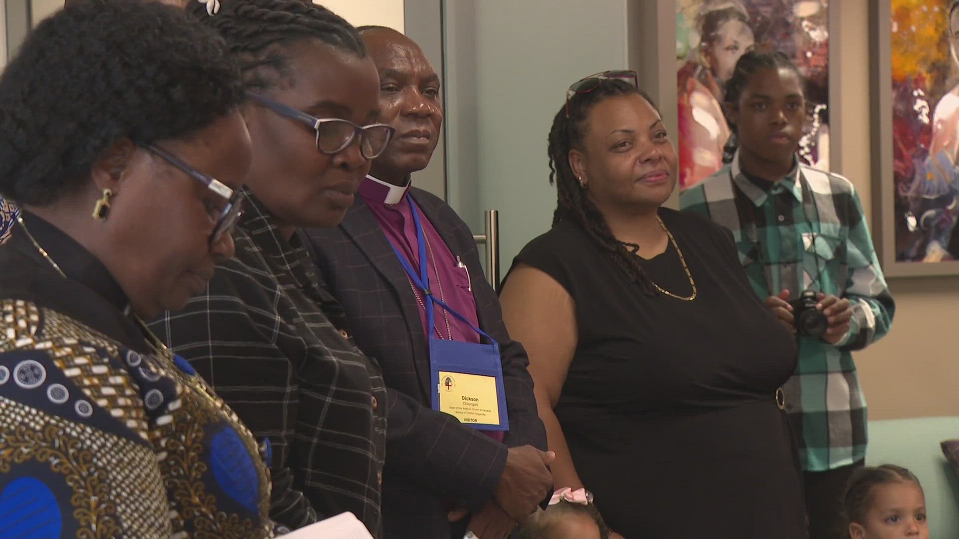 Tanzanian bishop tours Russell development in Louisville | whas11.com