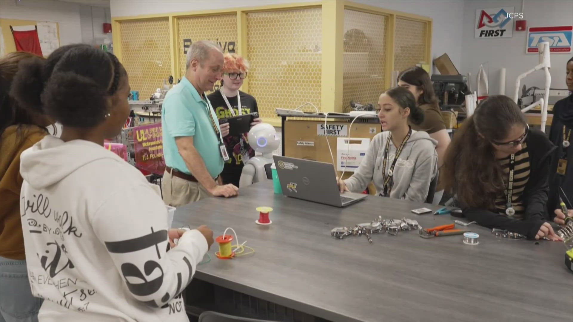 Louisville students make signs in braille for blind student | whas11.com
