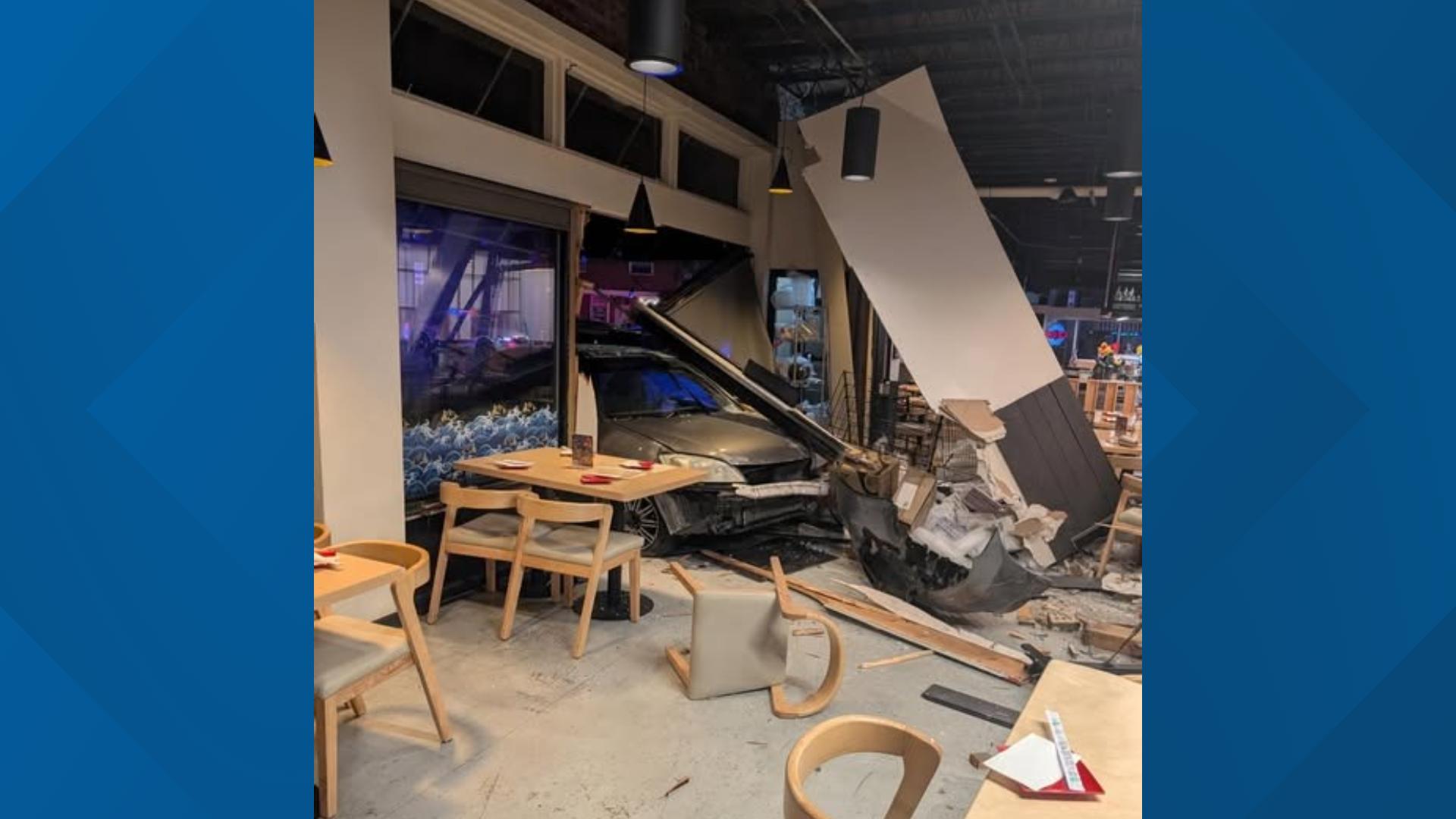 Man arrested after crashing car into Highlands ramen restaurant ...