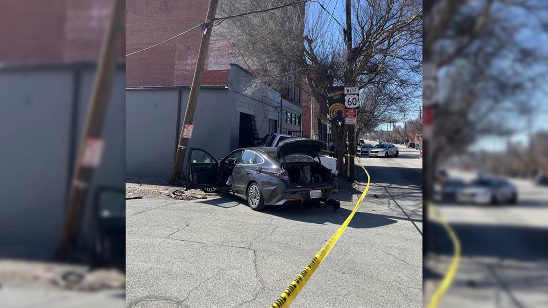 Car crashes into building near downtown Louisville, at least 1 person ...