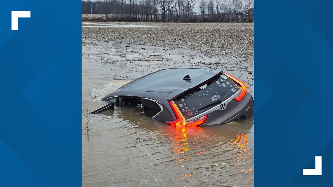 Indiana officer rescues woman trapped in vehicle under water | whas11.com