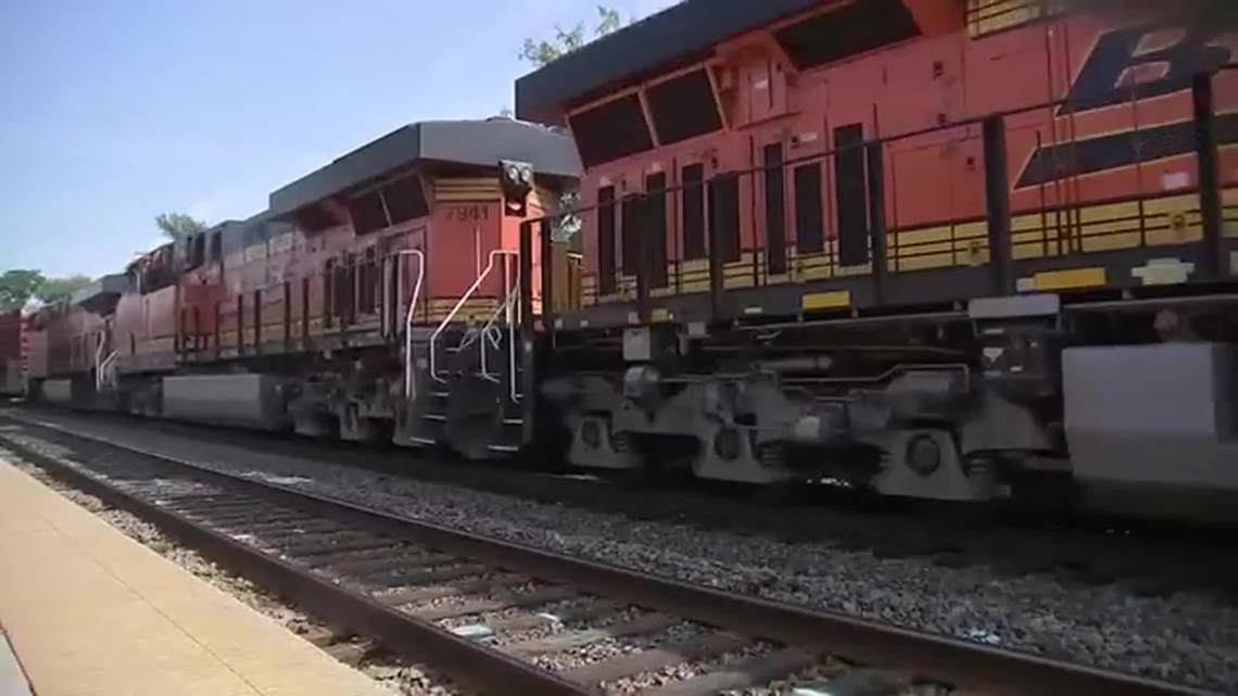 Video shows Illinois woman risking life crawling under train | whas11.com