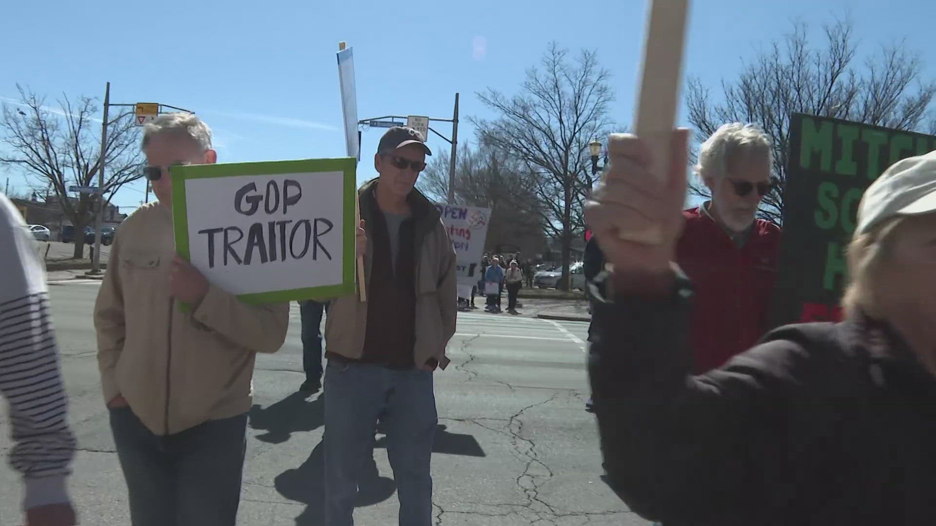 Louisville Democrats rally against Trump, DOGE funding cuts | whas11.com