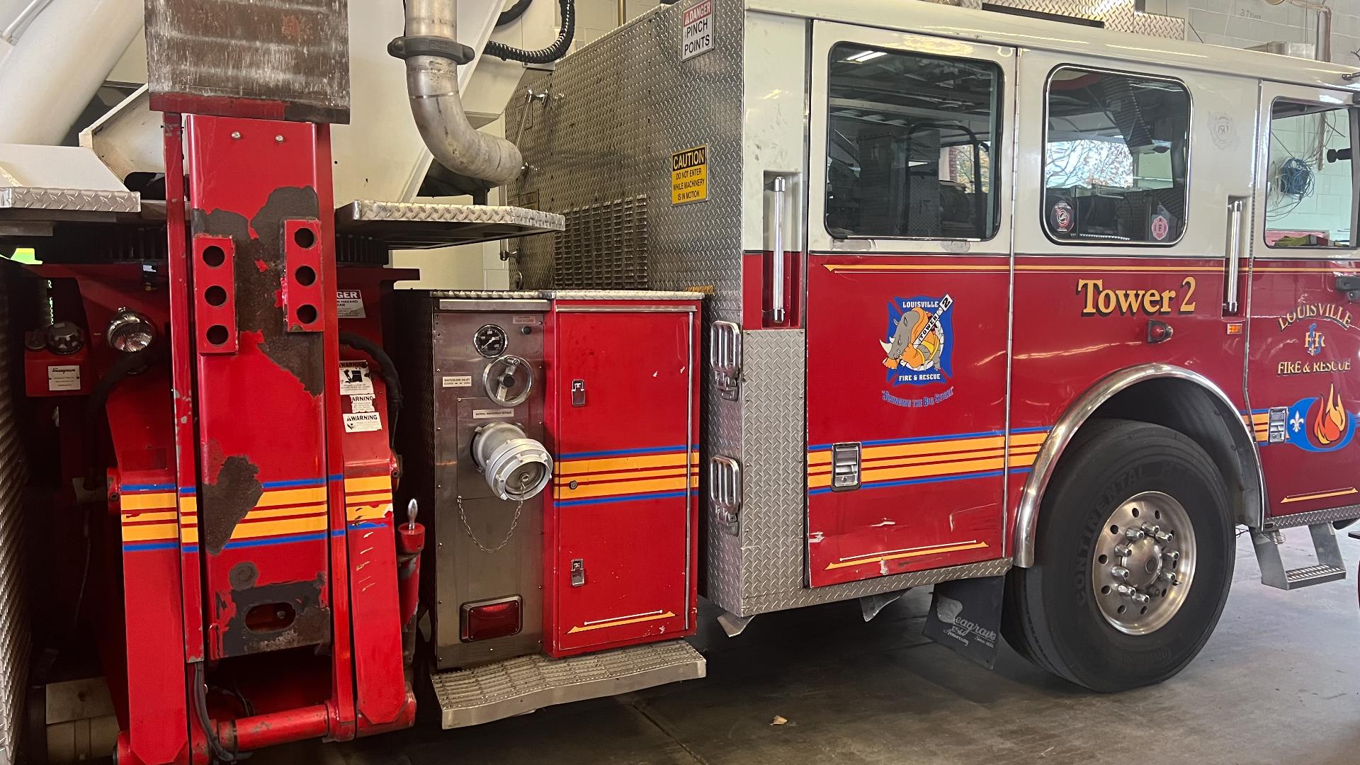 Louisville Fire rescues woman, 3 kids from car stuck in water in ...