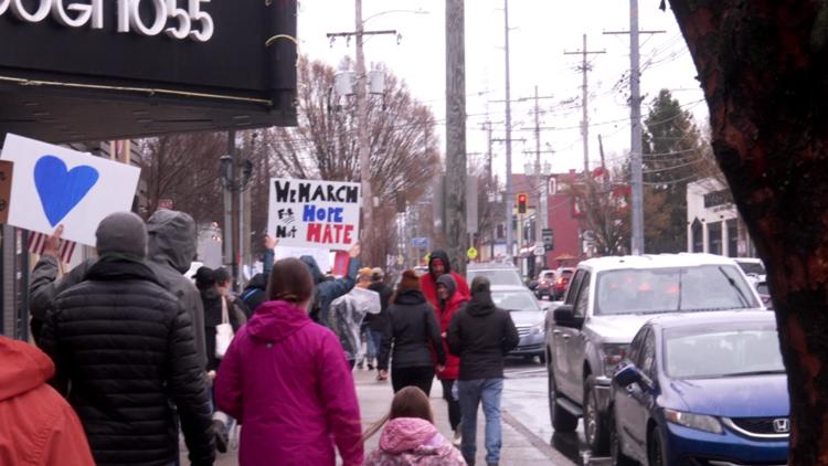 Louisville community protest Trump policies in 'We the People' march ...