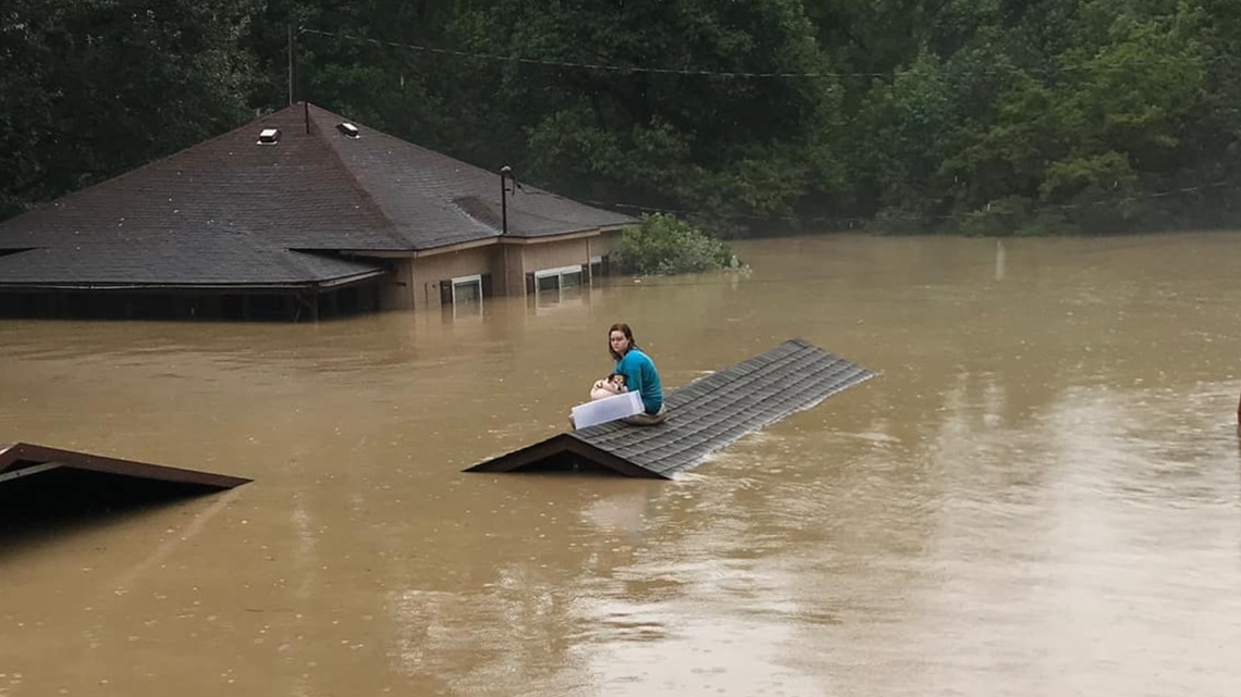 Young girl stranded on roof with dog in Kentucky flood now safe ...