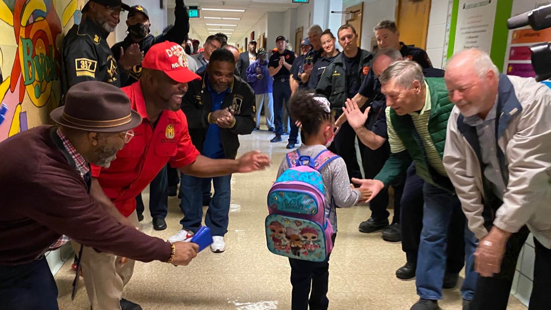 Flash Dads surprised Byck Elementary School students | whas11.com