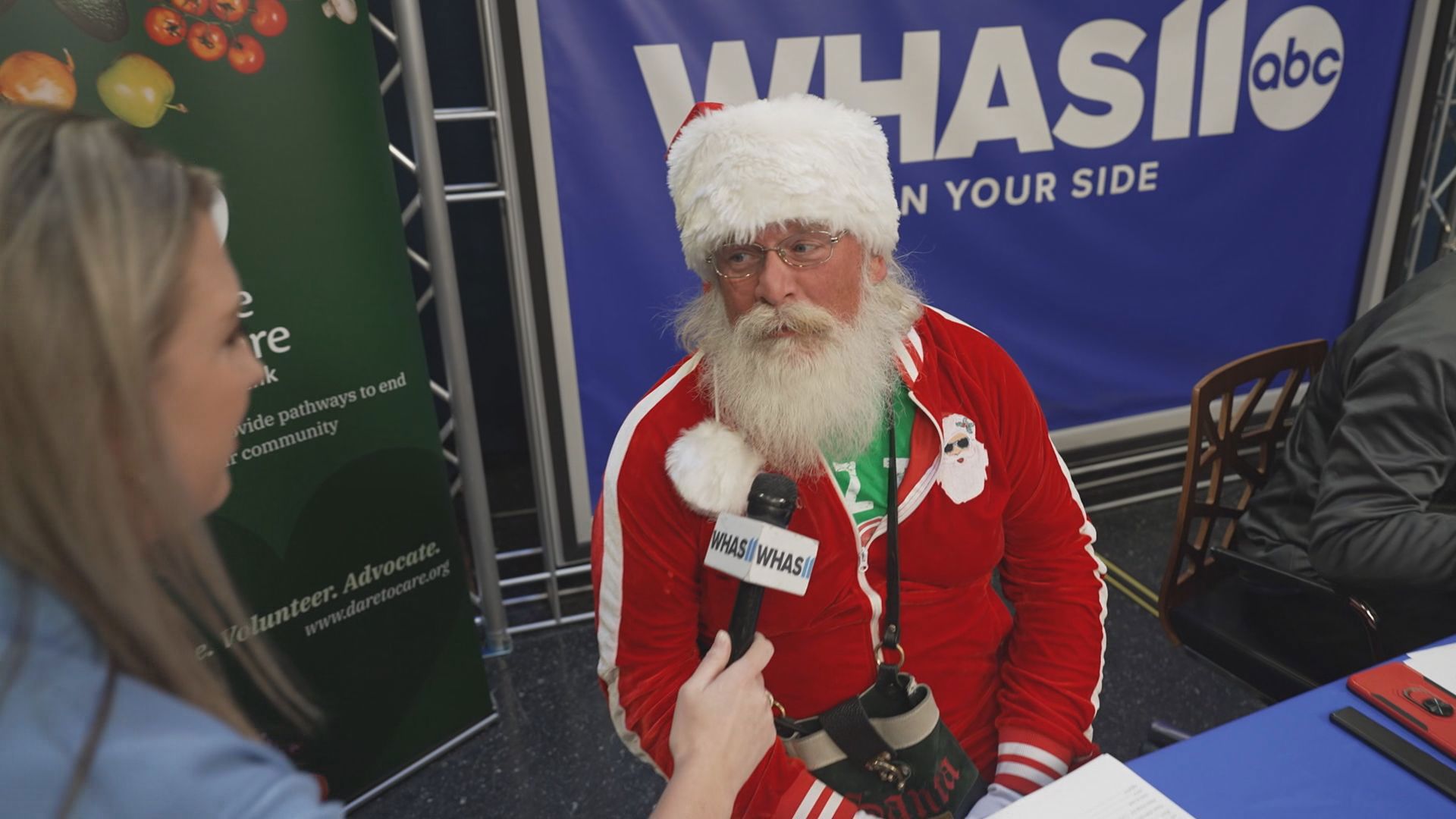 Santa is answering the phone during the WHAS11, Dare to Care telethon ...