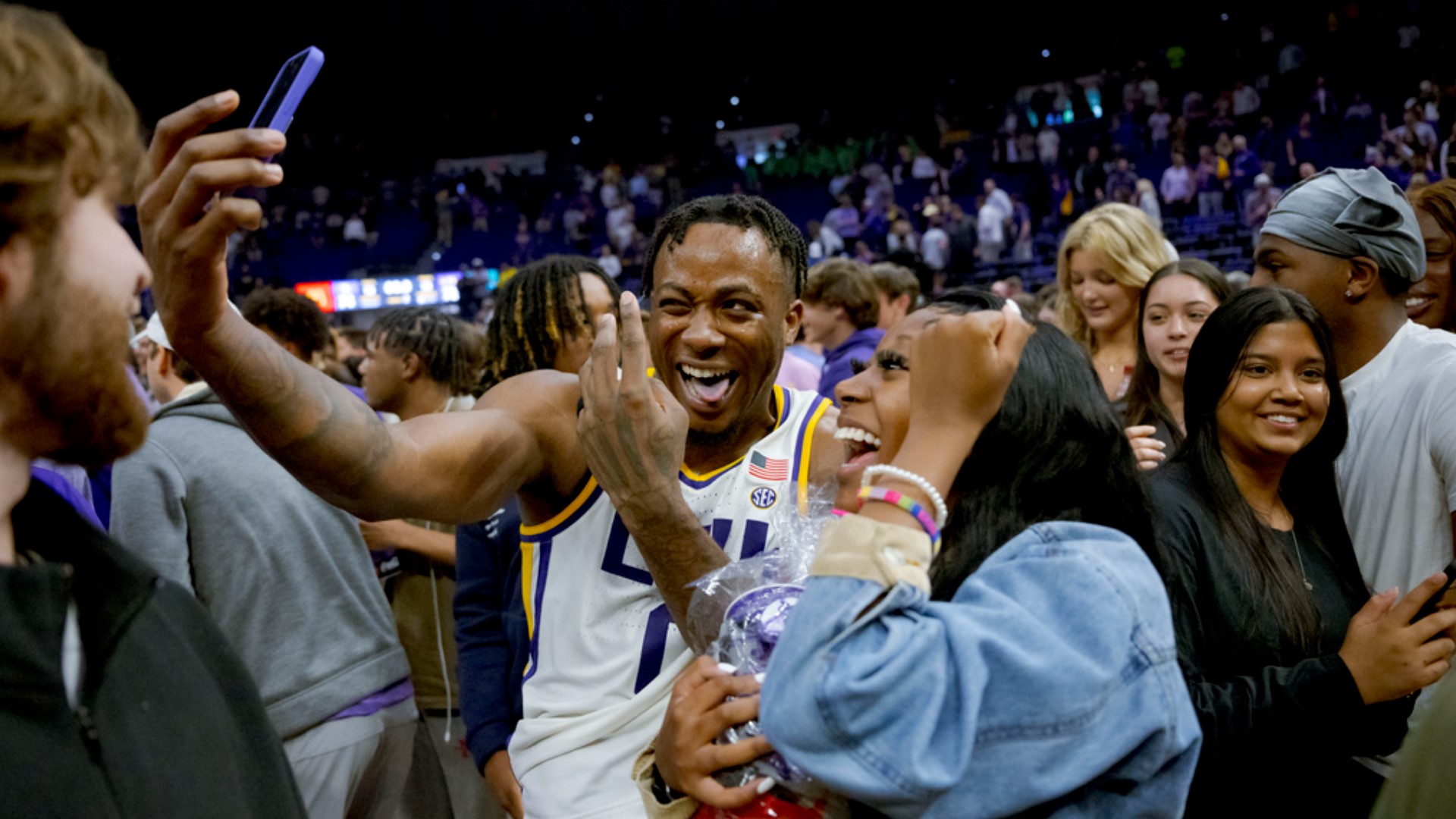 SEC fines LSU $100,000 for fans storming the court at end of upset of ...